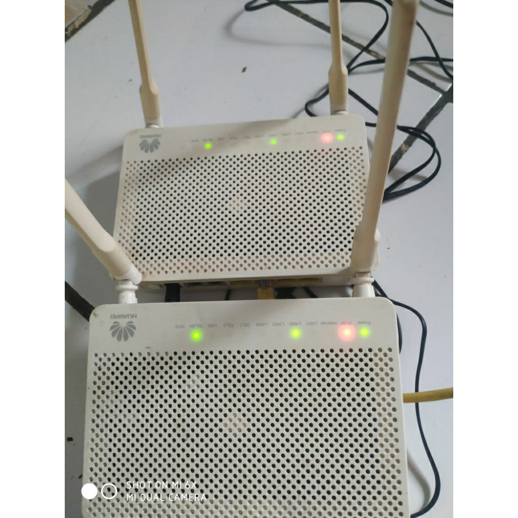 Jual Router HUAWEI HG8245H5 port biru lengkap adaptor, garansi nyala dan normal. Foto deskripsi ...