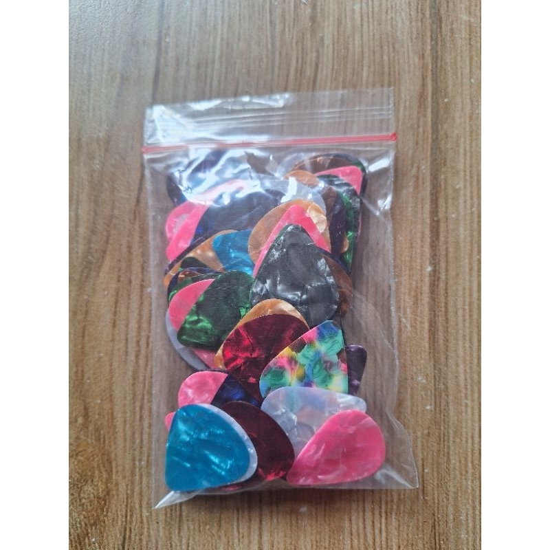 Jual pick guitar kerang pik gitar polos tanpa merek ukuran 046 isi 100 ...