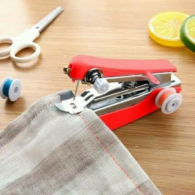 Jual mesin jahit mini portable handheld sewing | mesin jahit staples ...