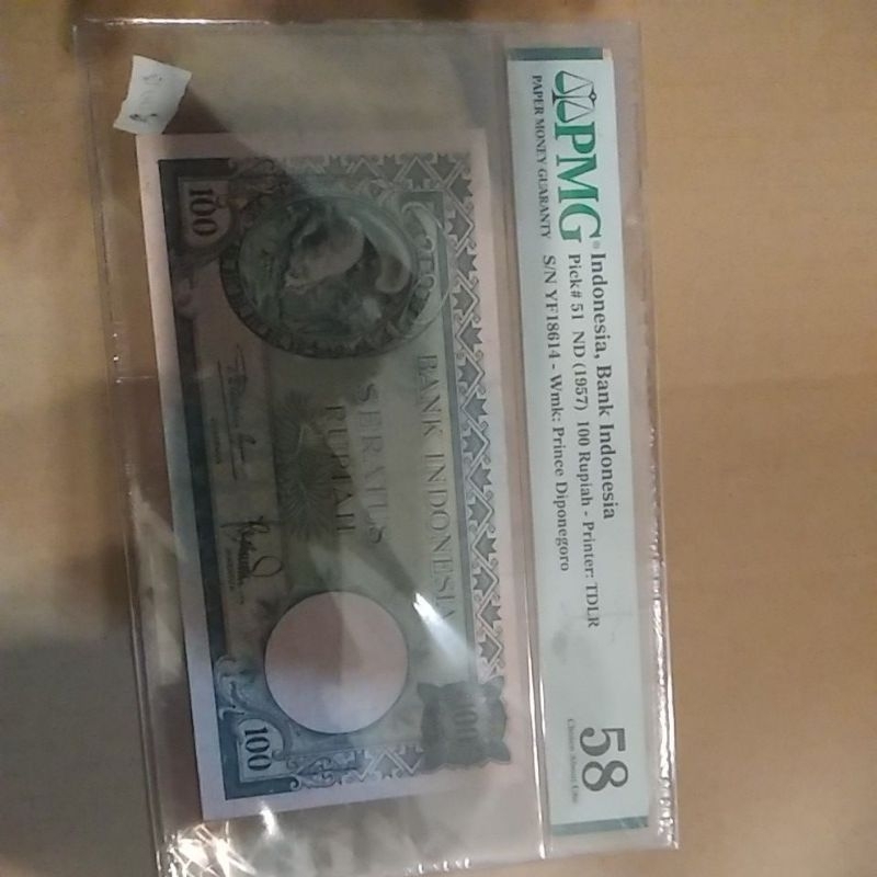 Jual 100 tupai 1957 pmg 58 polos | Shopee Indonesia