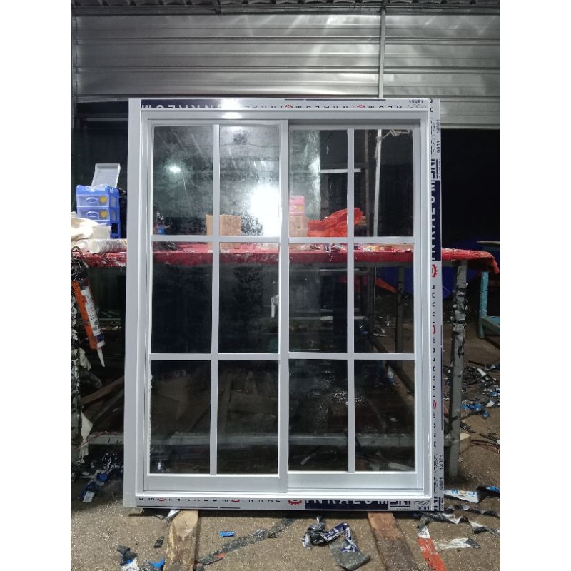 Jual jendela aluminium sliding geser dua daun + kaca 5mm kusen 3"+ peckingan kayu. UK L 120 T ...