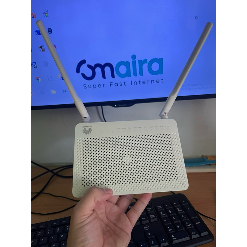 Jual Modem/Router Huawei EG8141H5 Port Biru Lengkap dengan Adaptor ...