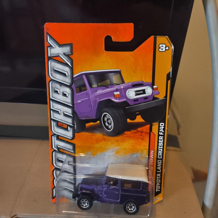 Jual Matchbox Land Cruiser FJ FJ40 Ungu MBX Old Town Purple | Shopee ...