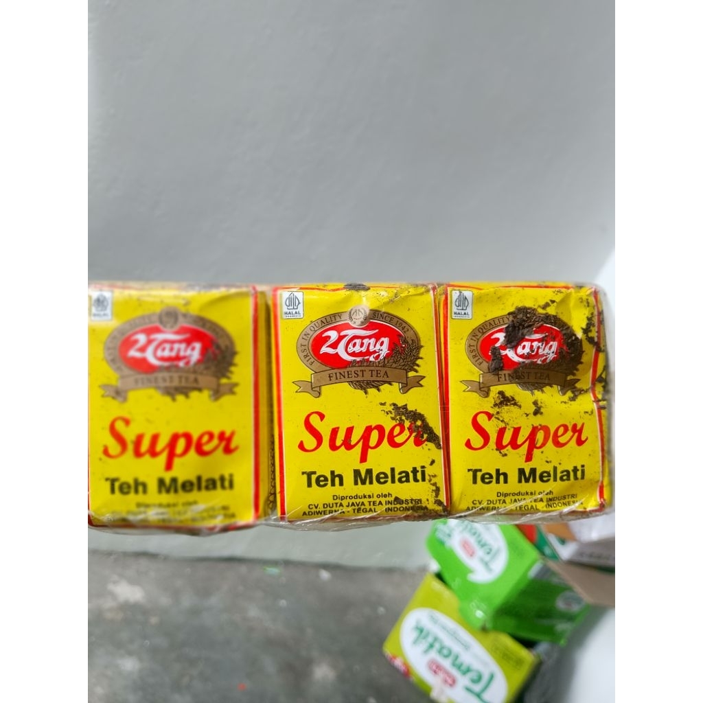 Jual Teh 2 tang kuning @40 gr isi 10 pcs ( 1 slop exp lama) | Shopee ...
