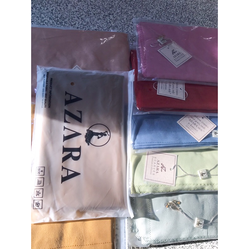 Jual KERUDUNG VOAL AZARA POUCH PLAT BESI leser cuting / JILBAB POLOS ...