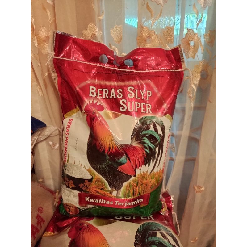 Jual BERAS CAP AYAM SLYP SUPER ( BERAS PREMIUM) KEMASAN 5 KG | Shopee ...