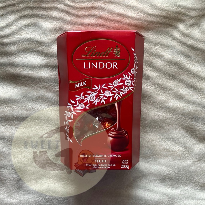 Jual Lindt Lindor Milk Chocolate & White Chocolate 200gr / Lindt Lindor ...