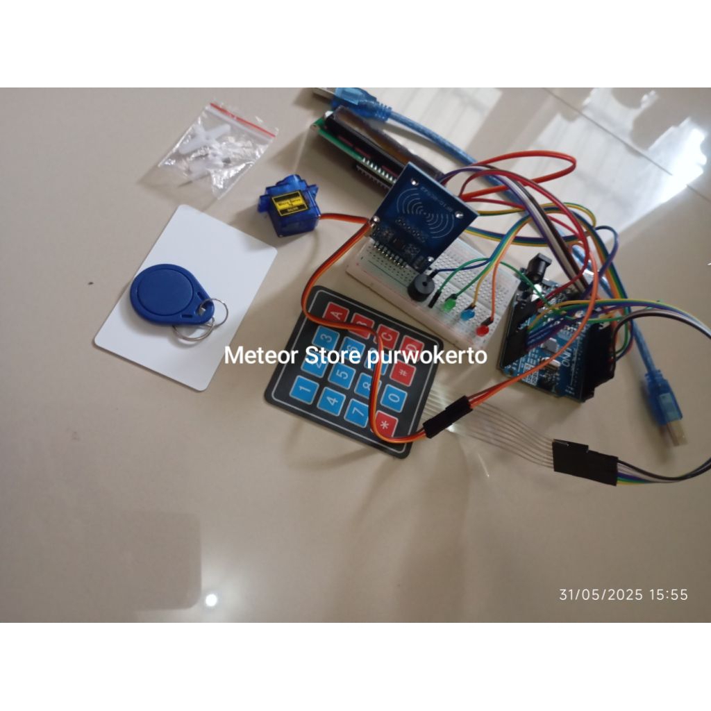 Jual sistem pengamanan access otomatis menggunakan Arduino uno rfid dan keypad servo sg90 buzzer ...