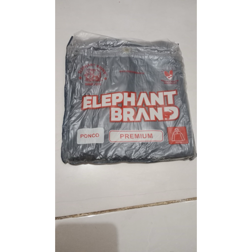 Jual jas hujan model ponco dari merek Elephant Brand. Pada kemasan ...
