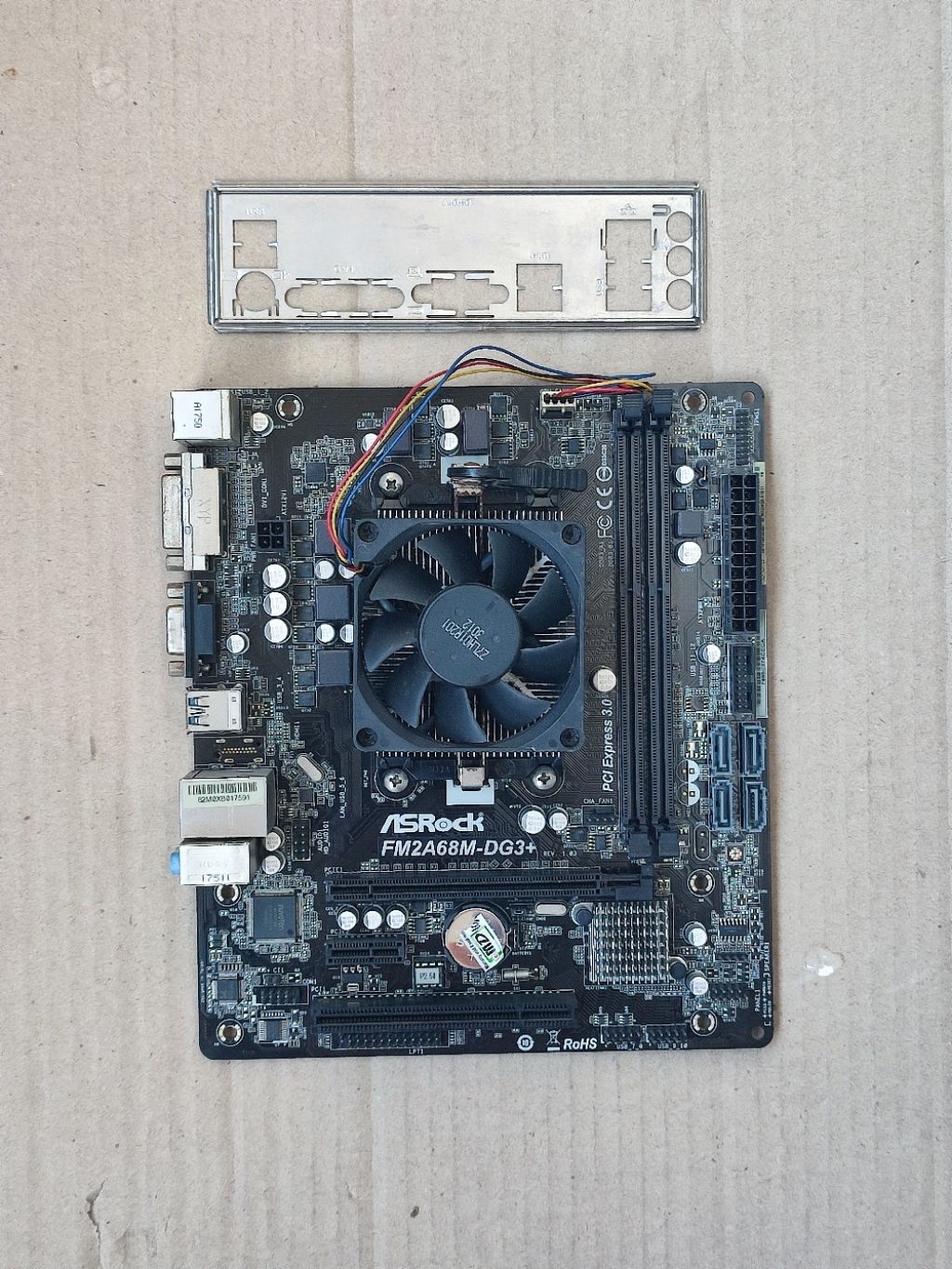 Jual motherboard mainboard amd asrock Soket fm2 + proc A6 7400K + fan ...