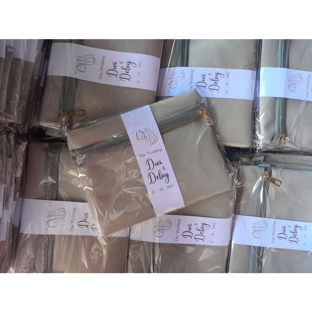 Jual Souvenir Pouch Miniso Emboss Murah - Souvenir Digi Clutch Miniso ...