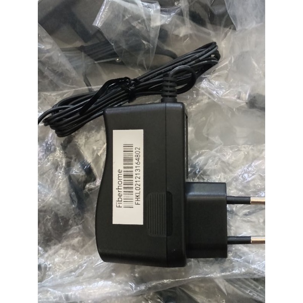 Jual Adaptor Ori Copotan stb ont modem router 12v 1a (Baru) | Shopee ...