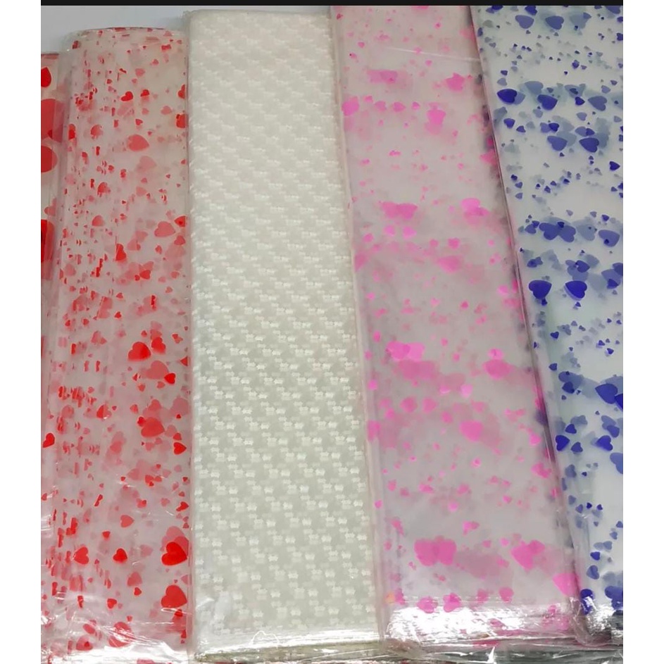 Jual PLASTIK PARSEL/PLASTIK HAMPERS TRANSPARAN MOTIF WARNA RANDOM (10 ...