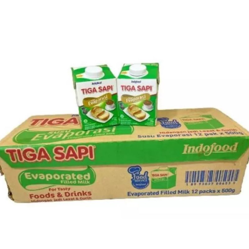 Jual susu evaporasi tiga sapi 500 ml per dus isi 12 pcs/evaporated milk ...