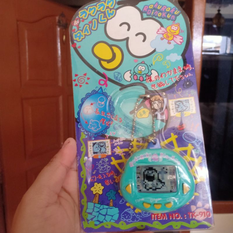 Jual Tamagotchi Raku Raku Dinokun Original Warna Biru Torquise | Shopee ...
