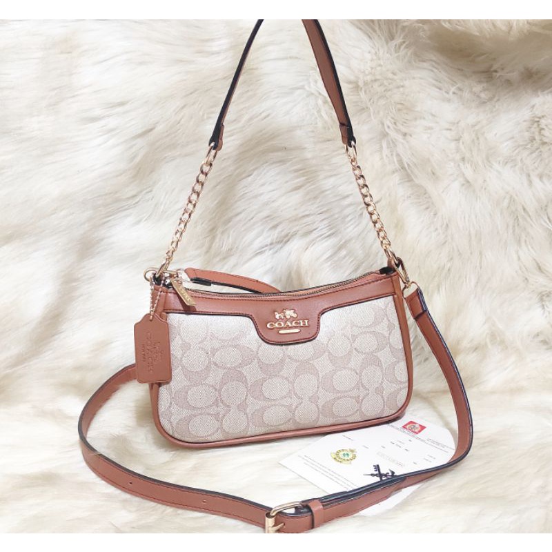 Jual CO4CH TERI LIST SHOULDER BAG IN SIGNATURE CANVAS UK 24x14 | Shopee ...