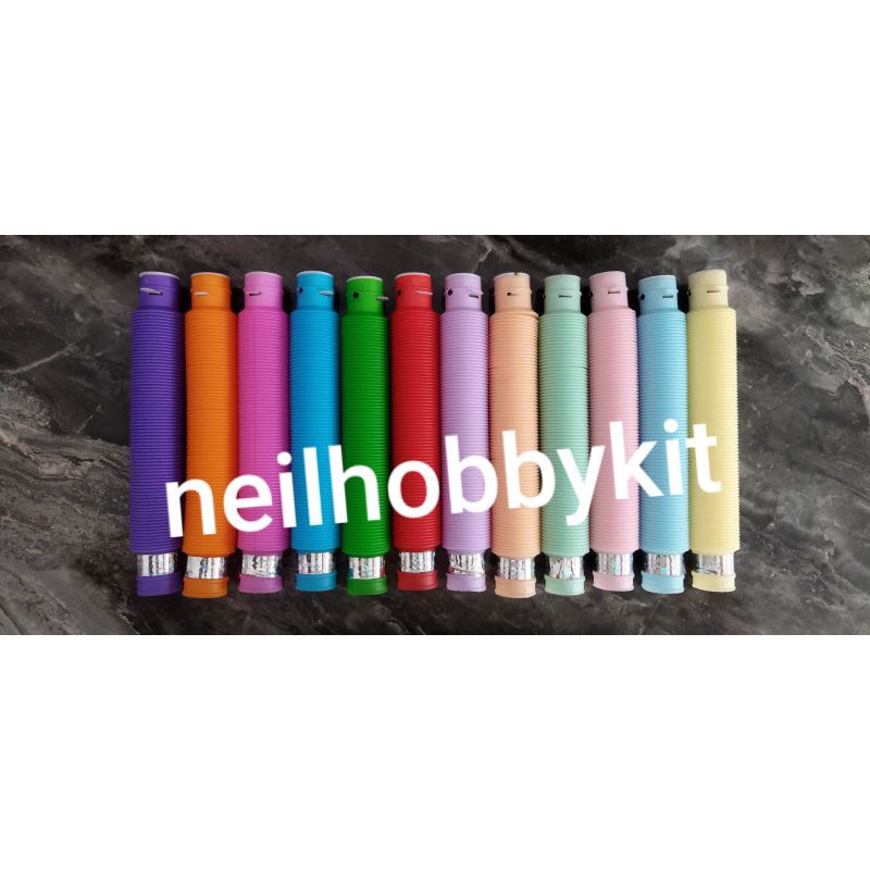 Jual Mainan Anak Pop Up Tubes Nyala / Pop up pipa nyala / pop up LED ...