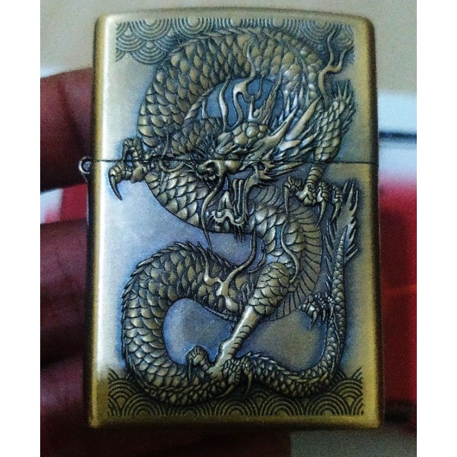 Jual Korek api zippo mancis corak naga timbul | Shopee Indonesia