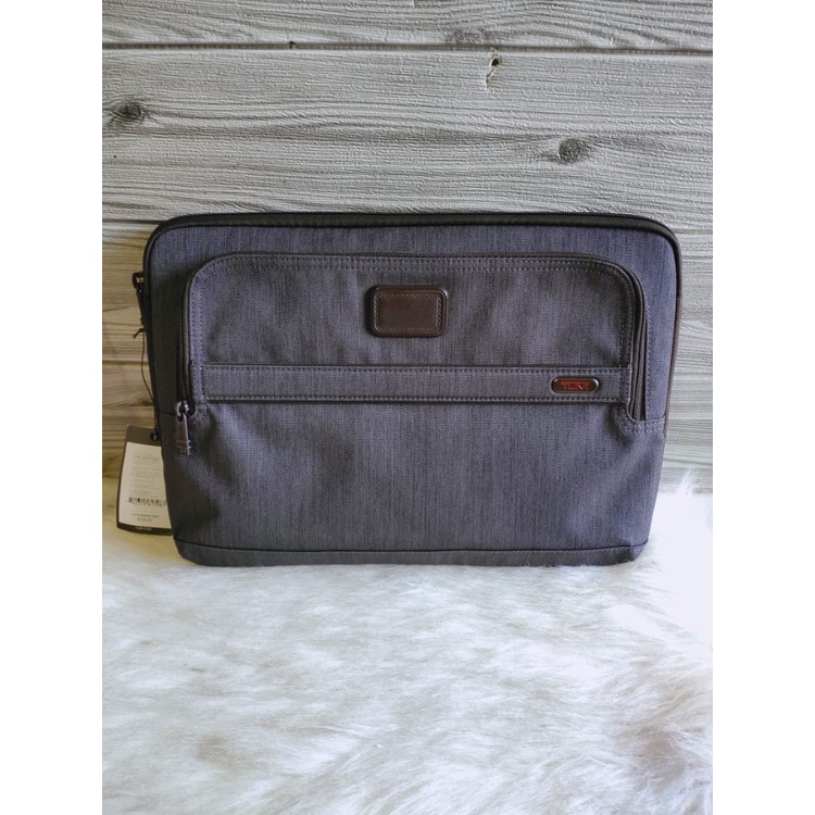 Jual Tas BRANDED ORI large laptop cover grey | Shopee Indonesia