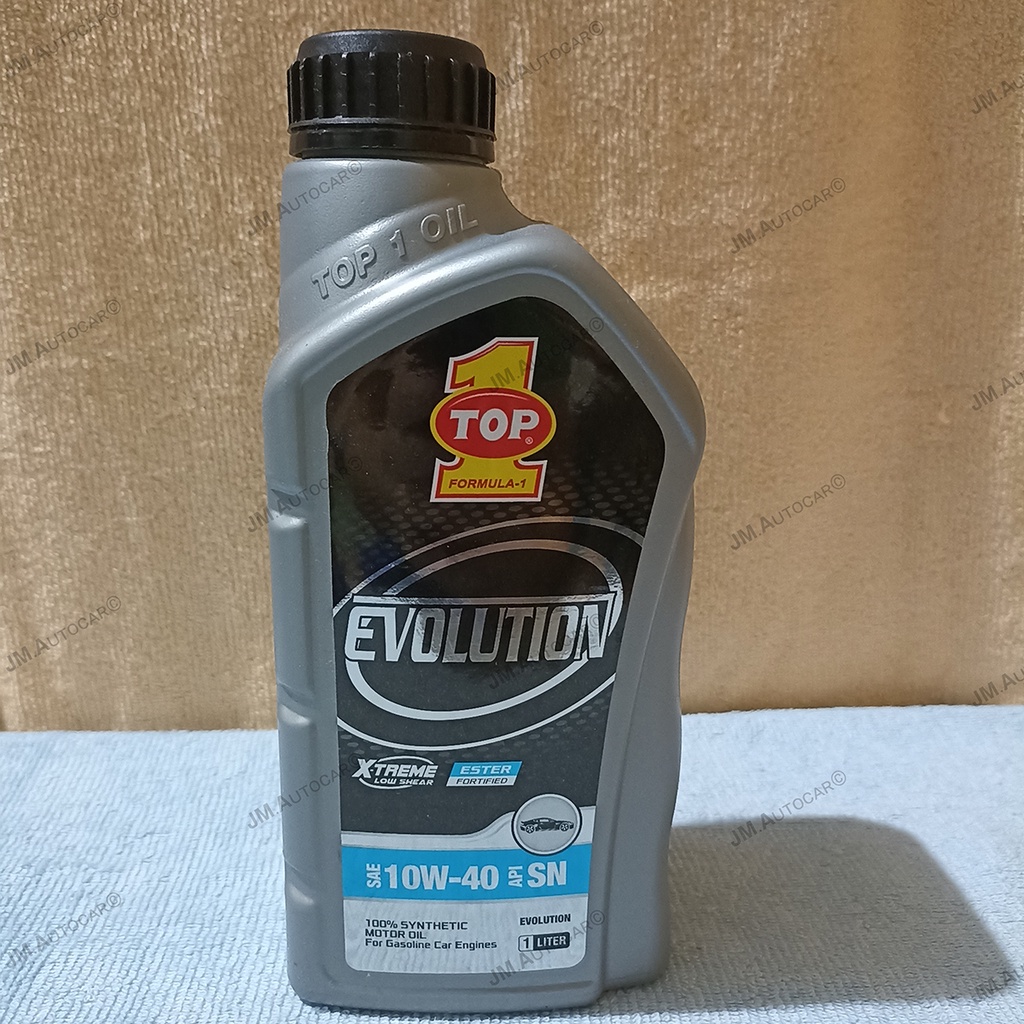 Jual Oli Mesin Top One Evolution SAE 10W - 40 API SN (1 liter ...