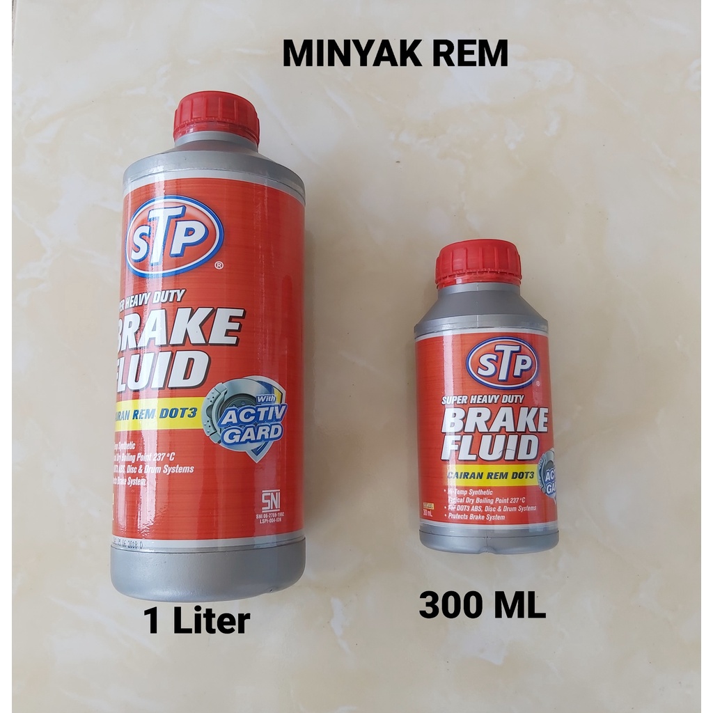 Jual Minyak Rem STP Merah / Oli Rem merek STP ukuran 1 liter dan 300 ml / Brake Fluid | Shopee ...