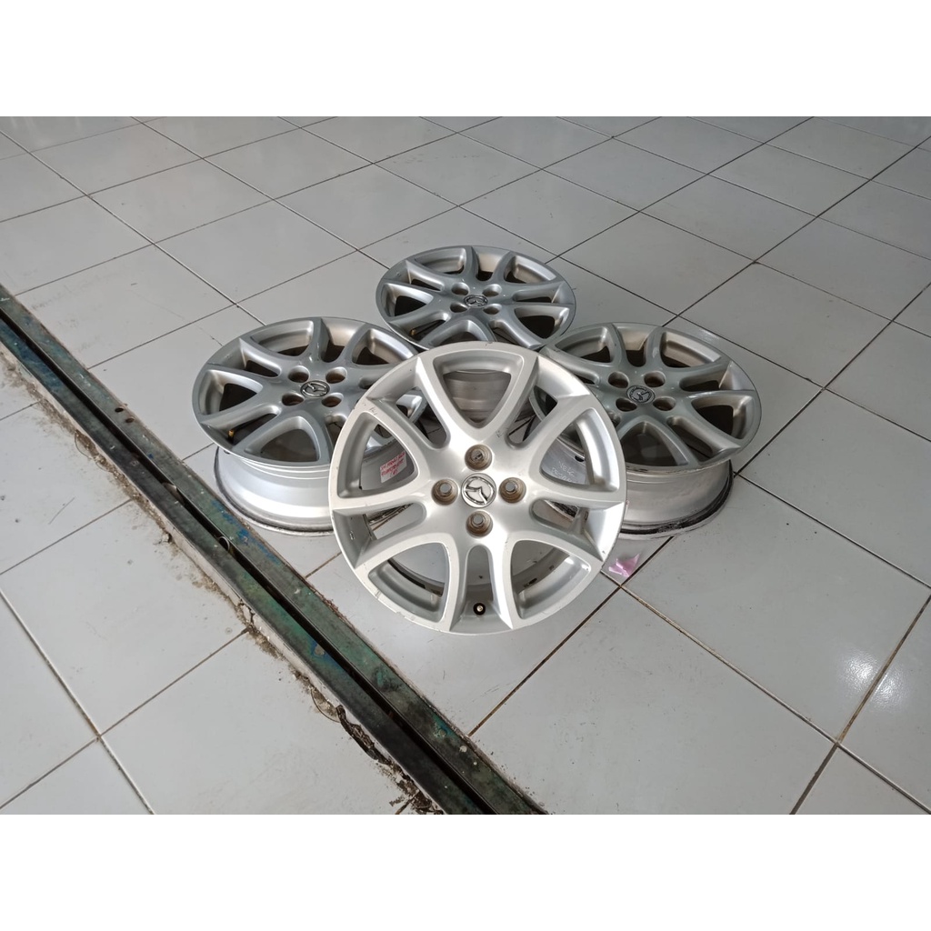 Jual 1 set 4pcs Velg Mobil Oem Original Mazda2 Ring Baut 4x100 Silver ...