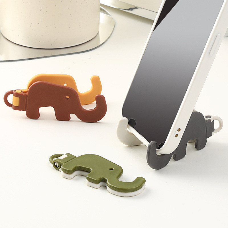 Jual STAND HANDPHONE MINI FOLDABLE DENGAN KEYCHAIN BISA DIJADIKAN ...