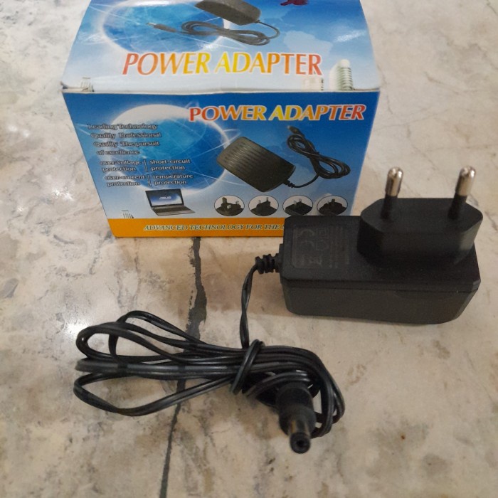 Jual power adaptor 12v input : AC100-240v 50/60Hz Output : Dc12v-2A ...