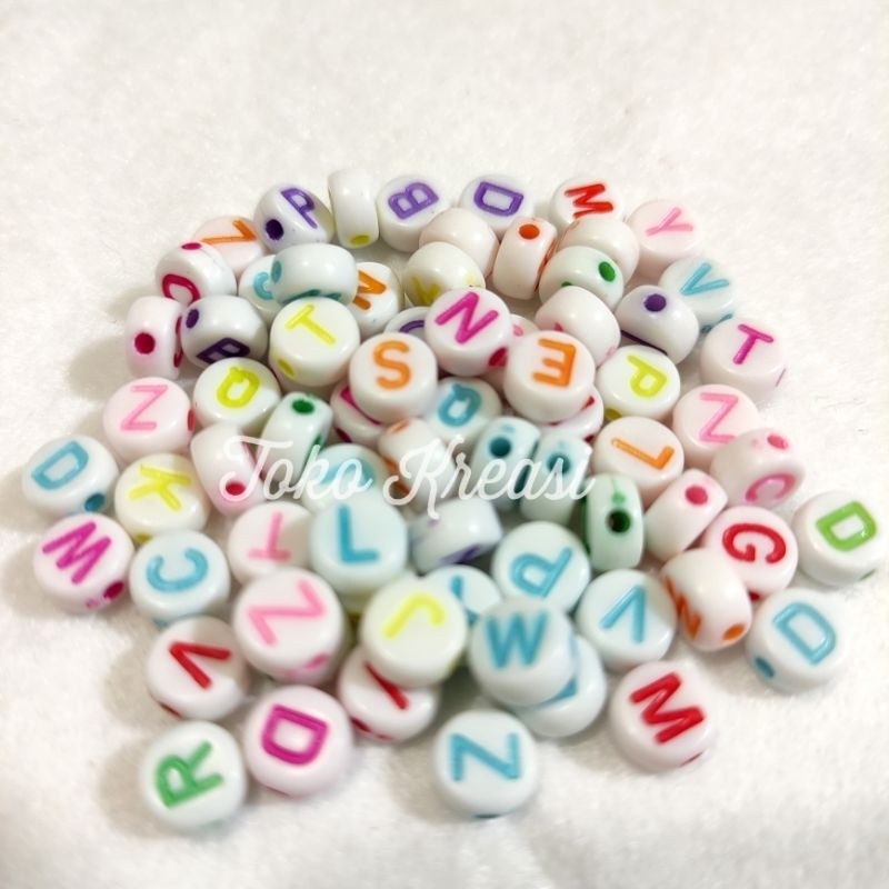 Jual (50pcs) Random Mote Huruf / Abjad / Alphabet bulat putih tulisan ...