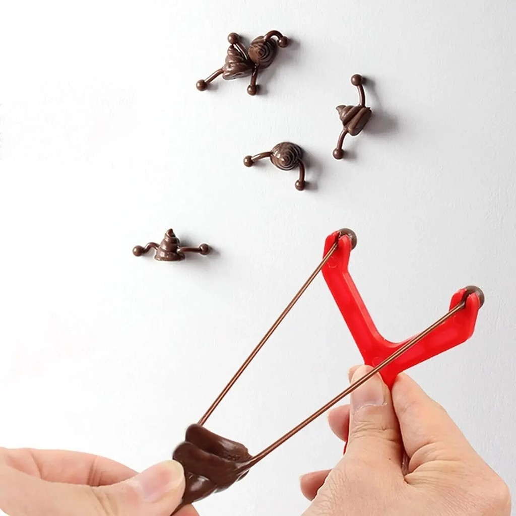 Jual 12pcs Poop Slingshot Toy Mini Rubber Slingshot Flying Poop Toys ...
