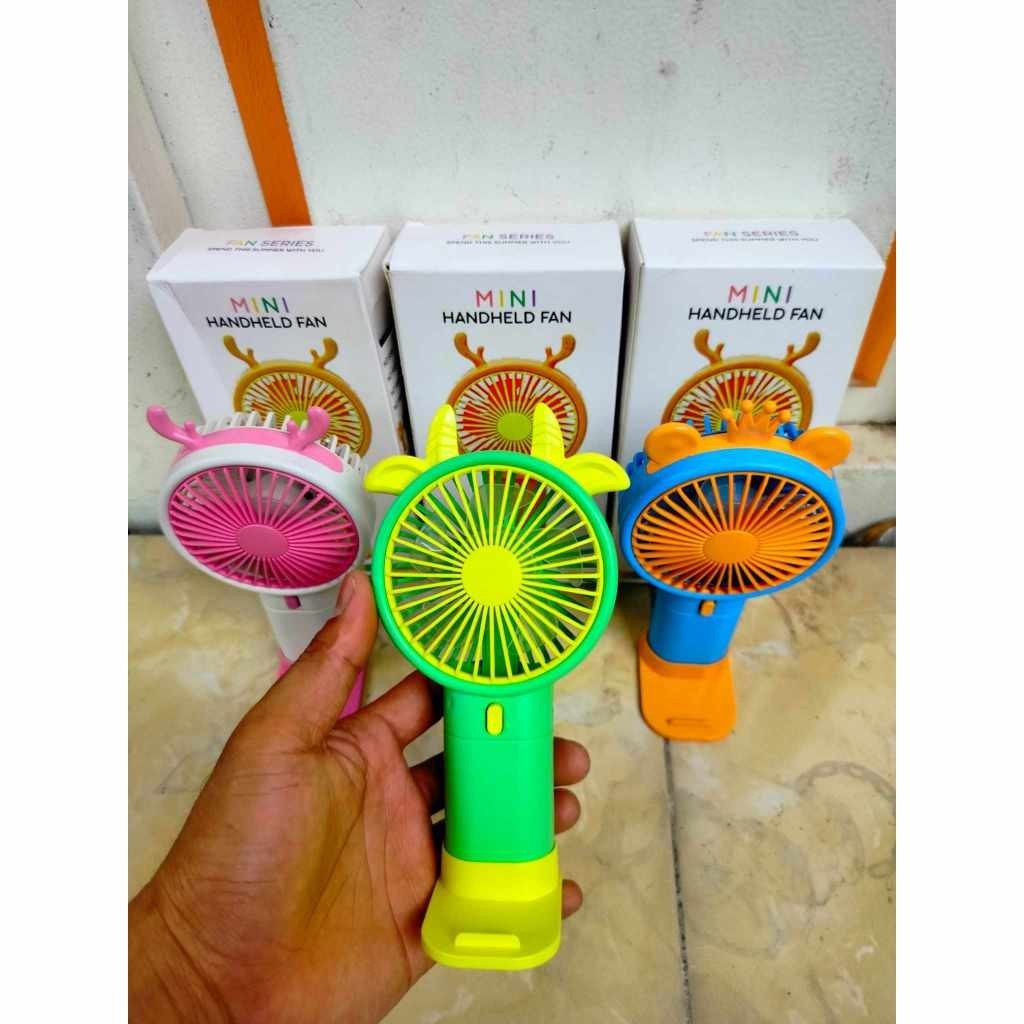 Jual TOM Kipas Angin Tangan Genggam Karakter Tanduk / Kipas Mini Stand ...