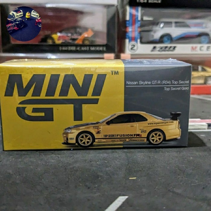 Jual Mini GT Nissan Skyline GTR R34 Top Secret Gold No 676 | Shopee ...