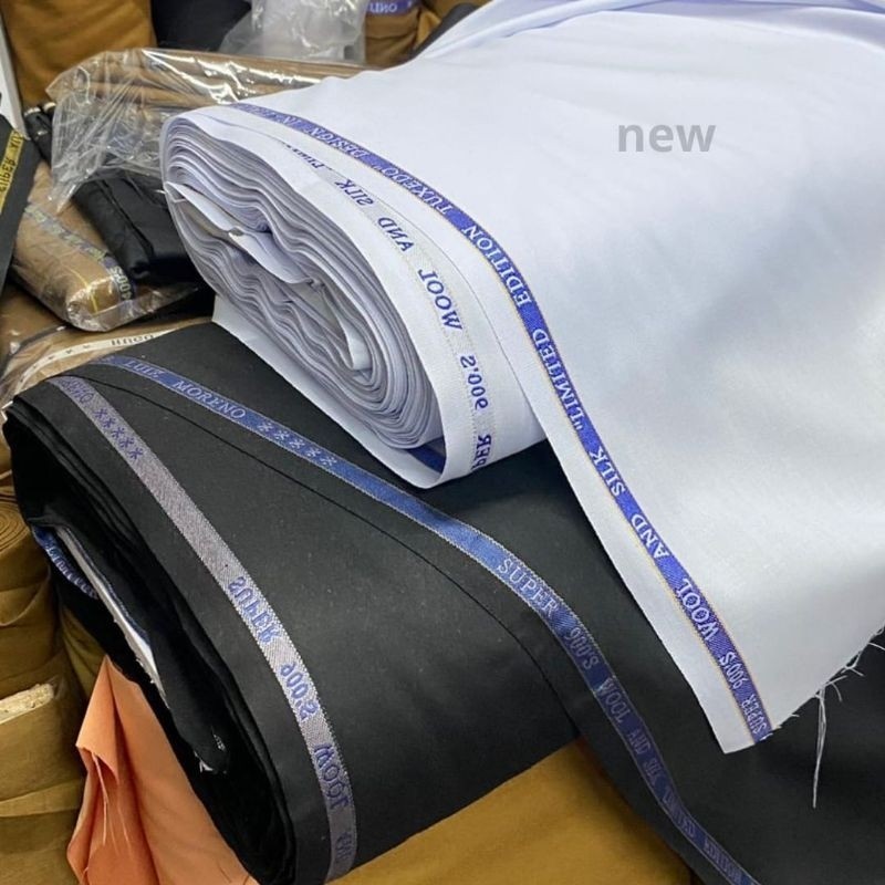 Jual kain semi wool premium bahan kain hitam putih luiz moreno | Shopee ...