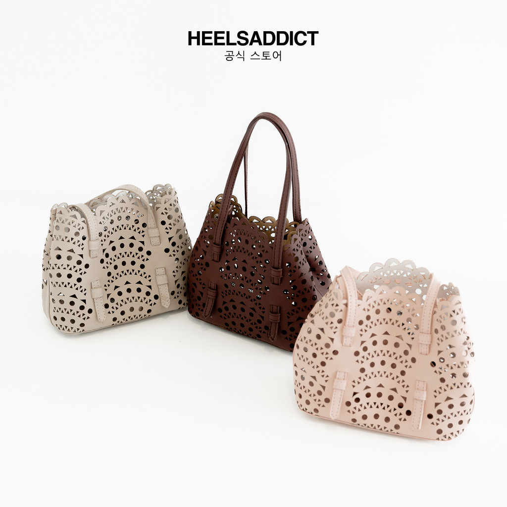Jual HEELSADDICT Mini Amber Laser Cut Sling Bag | Shopee Indonesia